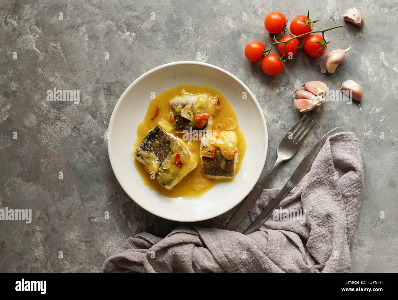 bacalao al pil pil, salted cod in emulsified olive oil sauce, spanish ...