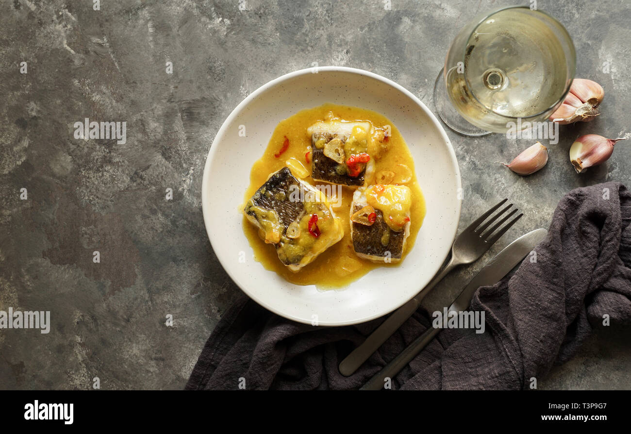 bacalao al pil pil, salted cod in emulsified olive oil sauce, spanish ...