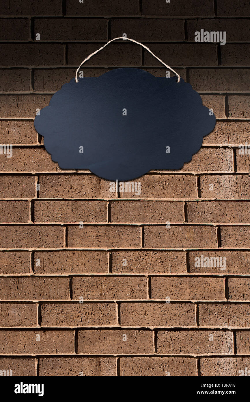 Black Empty Sign Board with string for hanging on wall Stock Photo - Alamy