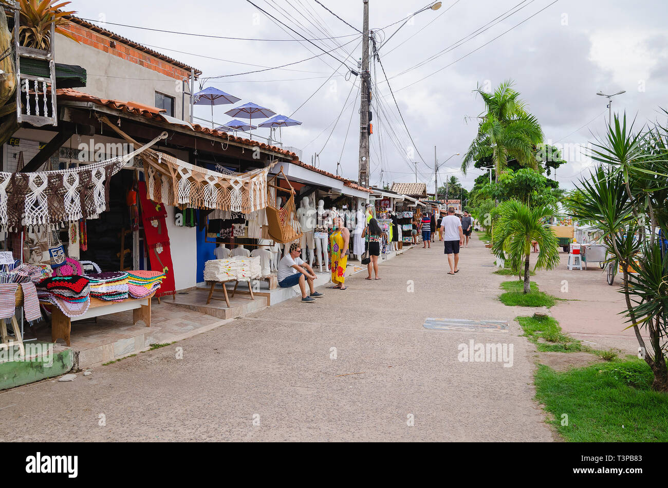 Cabedelo - PB, Brazil - February 23, 2019: Street with shops that sells ...