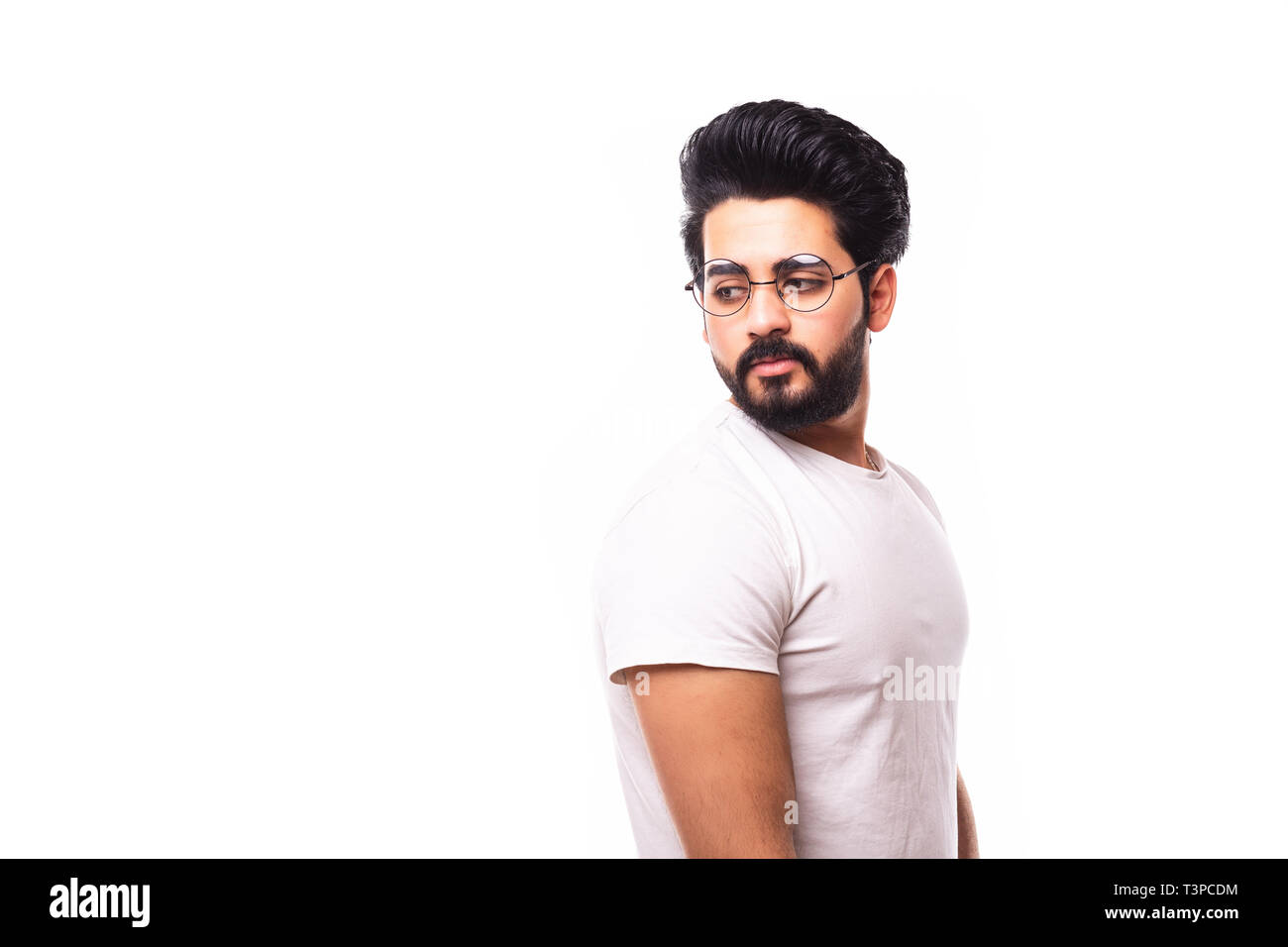 Smiling man looking over his shoulder Stock Photo - Alamy