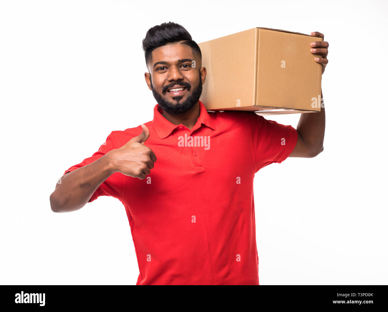 smiling delivery man in blue uniform carrying packages while gesturing ...