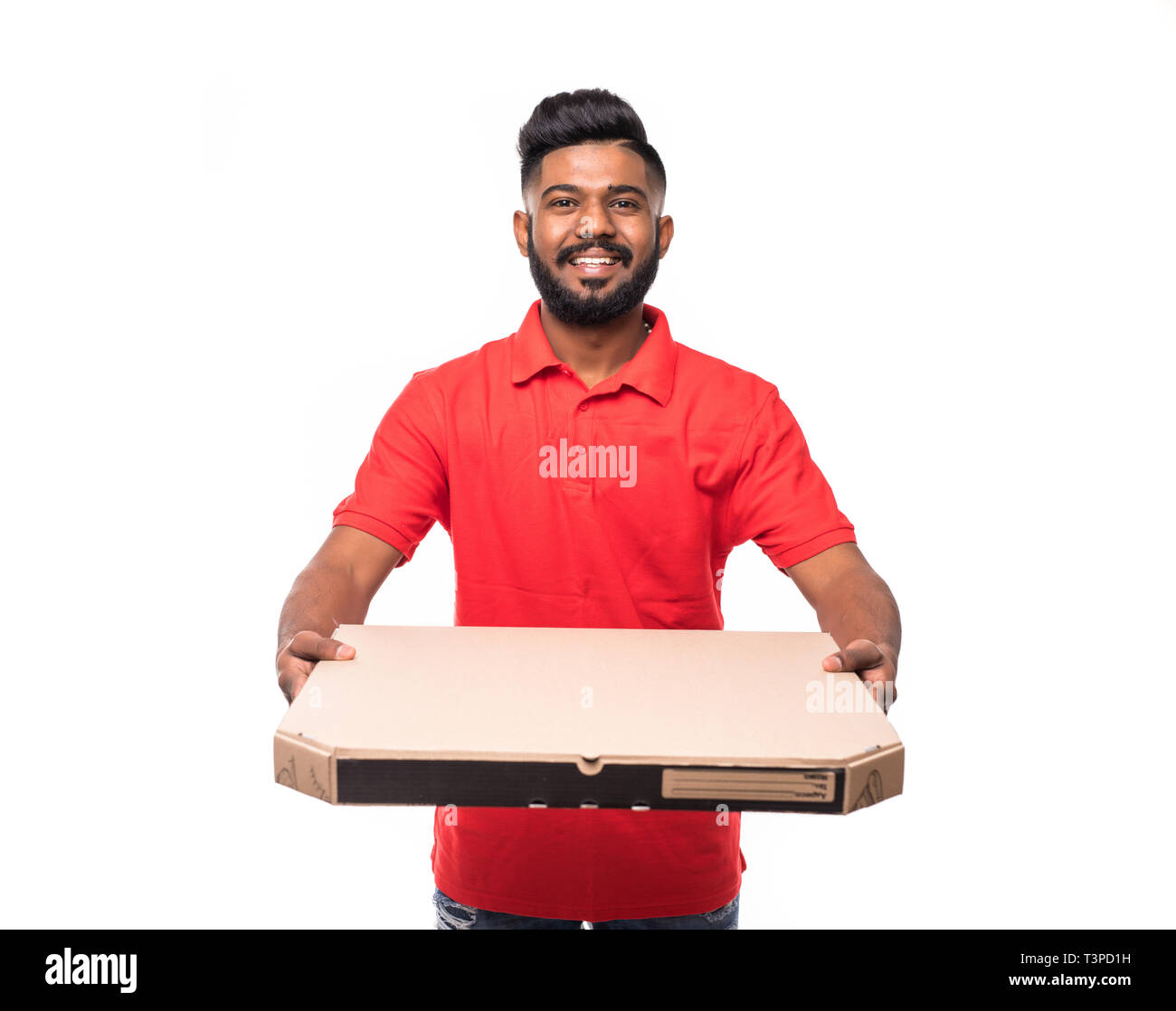 Delivery Concept: Handsome pizza delivery man courier in red uniform ...