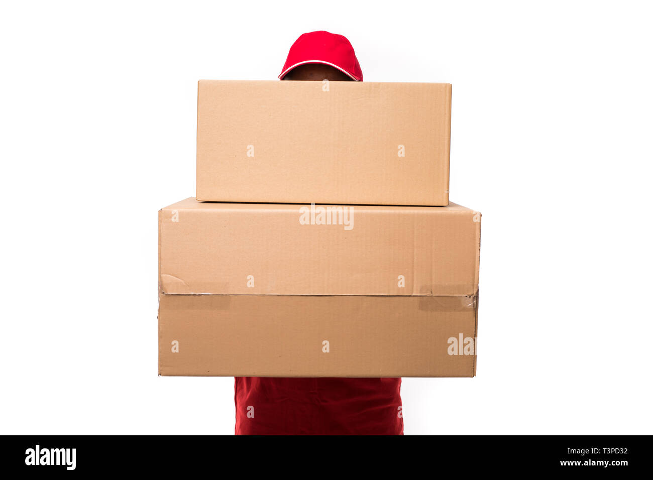 Happy smiling delivery man carrying boxes isolated on white background ...