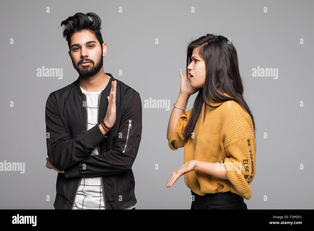 emotional young couple quarreling isolated on white Stock Photo - Alamy