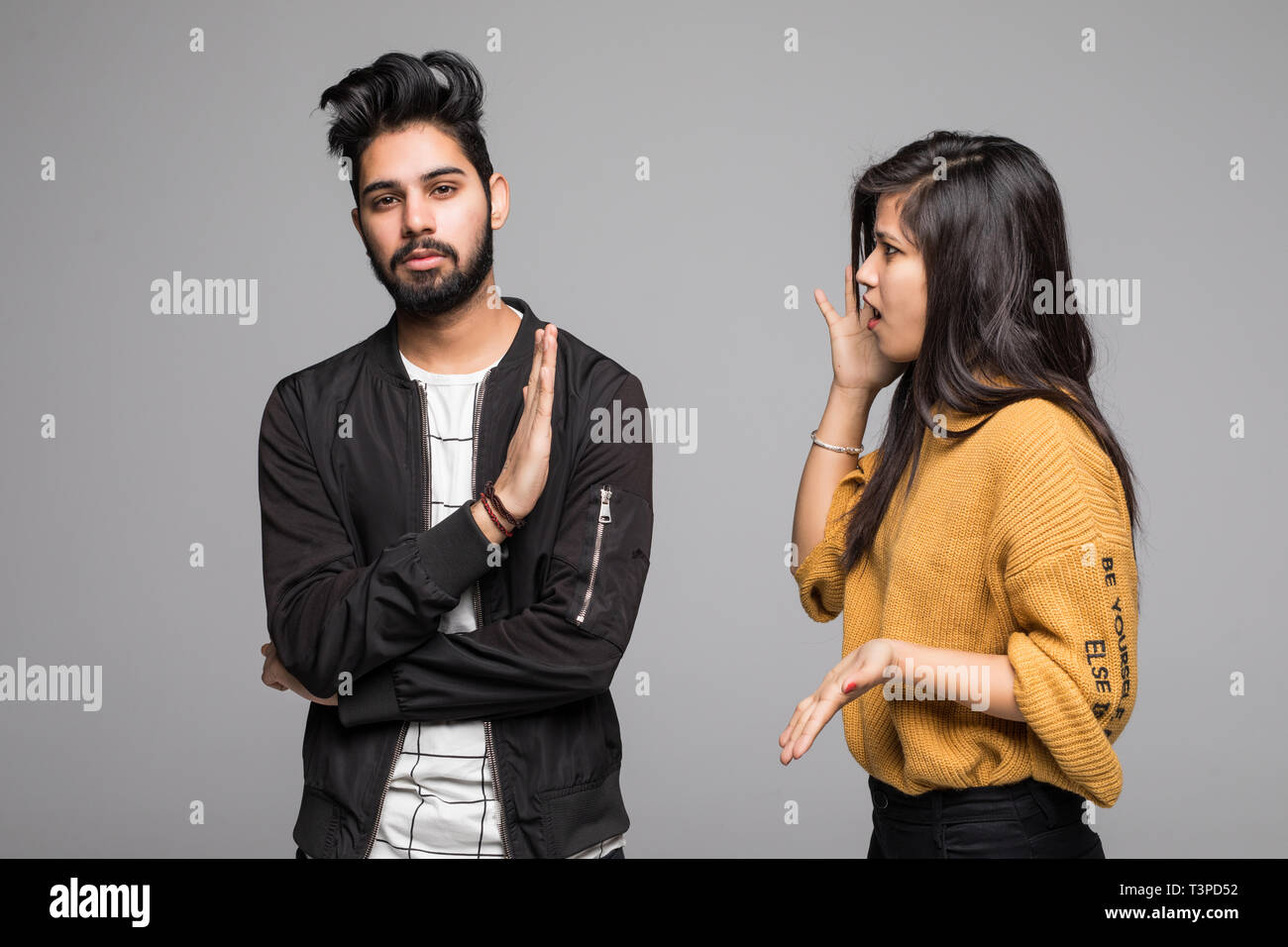 emotional young couple quarreling isolated on white Stock Photo - Alamy