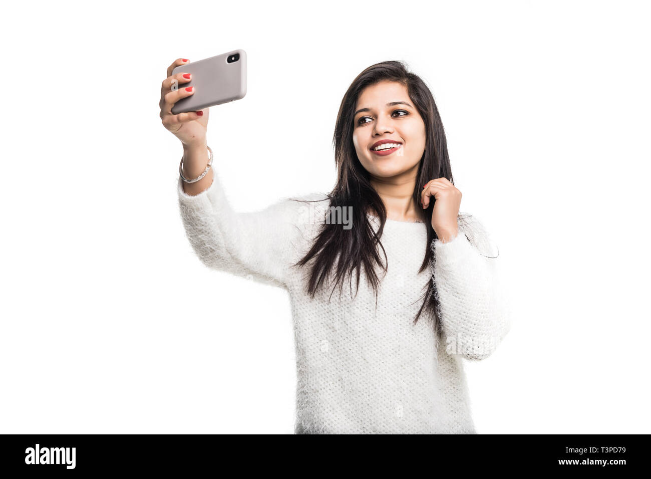 Indian young girl taking selfie with smartphone Stock Photo - Alamy