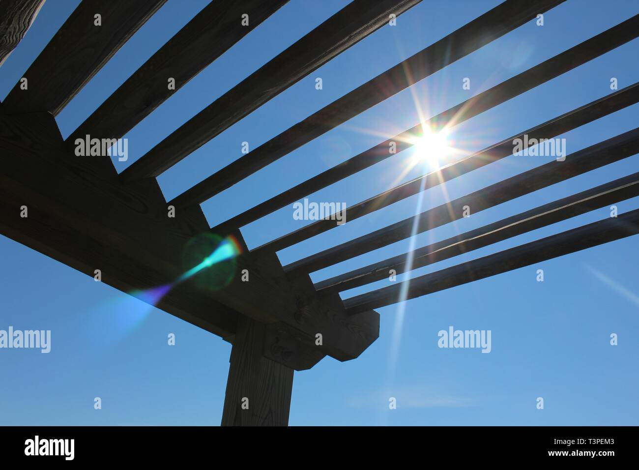 summer sky sun shining lens flare shine sun ray sun light light blue sky architecture Stock ...