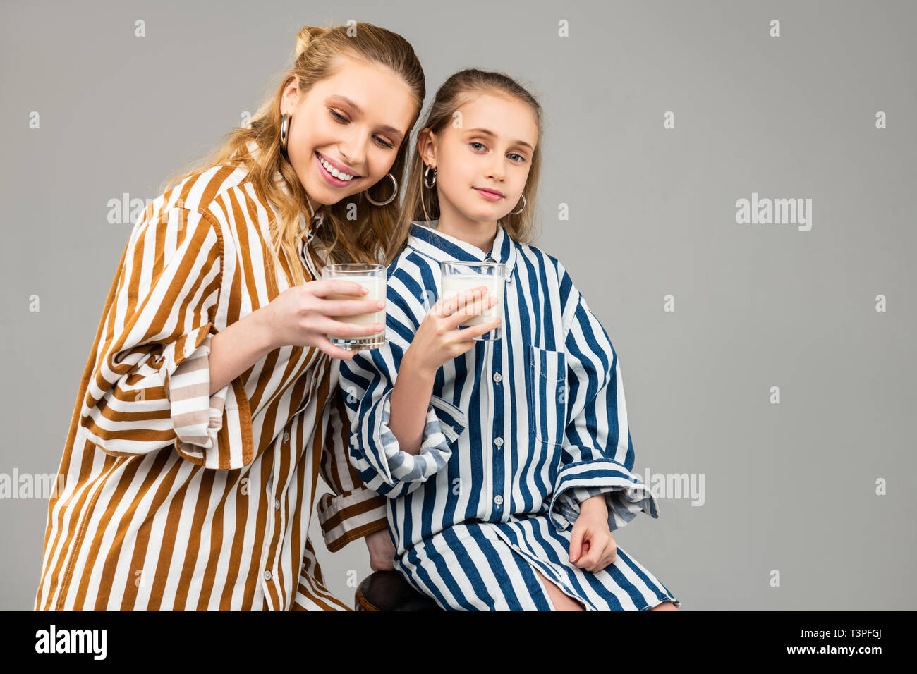 Different generations standing together hi-res stock photography and images - Alamy