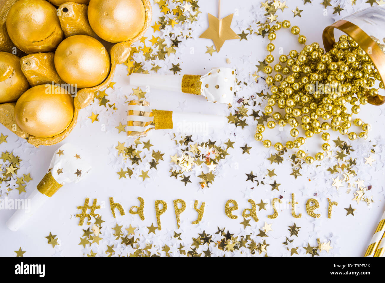 Luxury easter celebration concept, top view of golden items used to ...