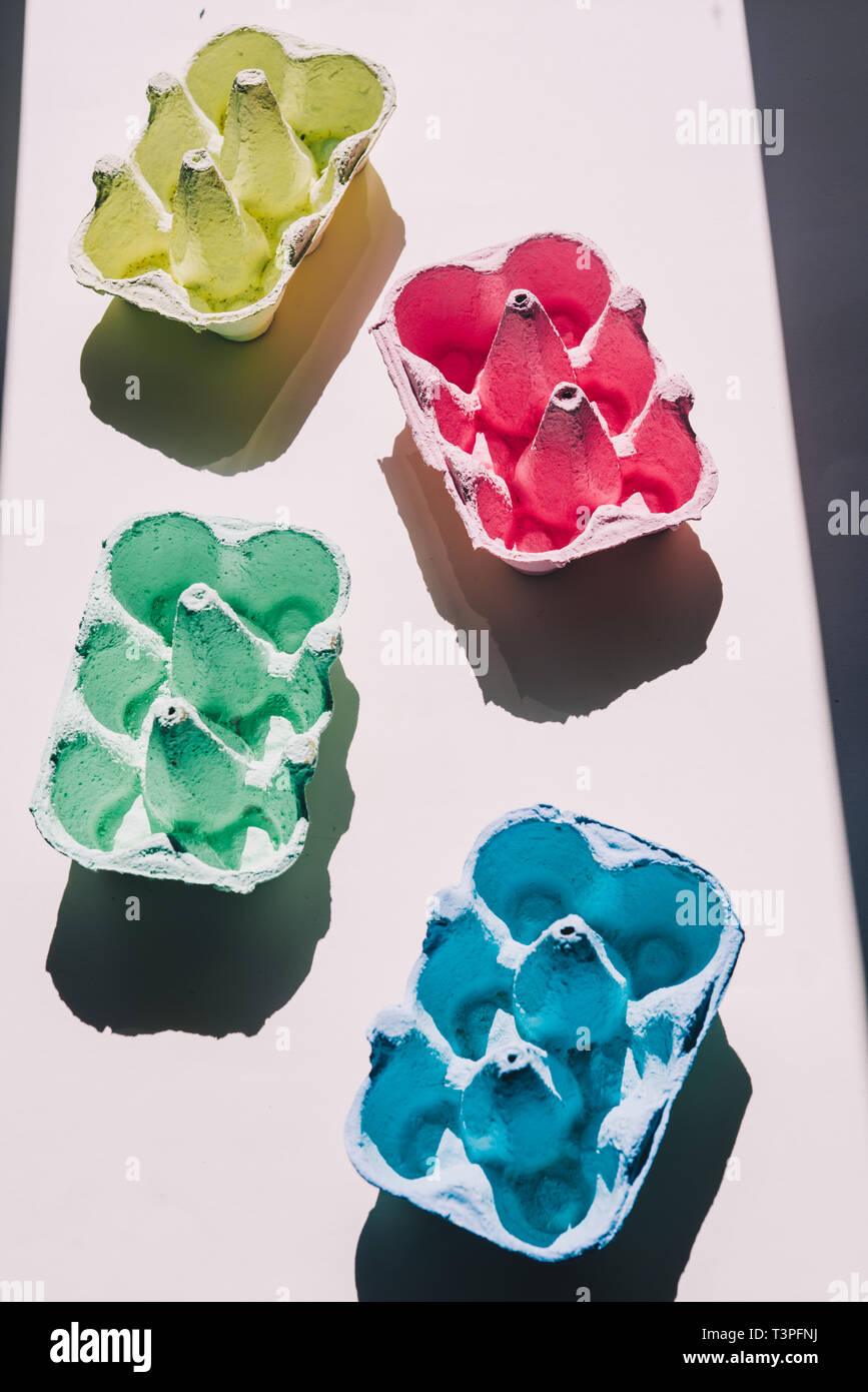 Colored eggs container, easter concept, hard natural direct light Stock ...