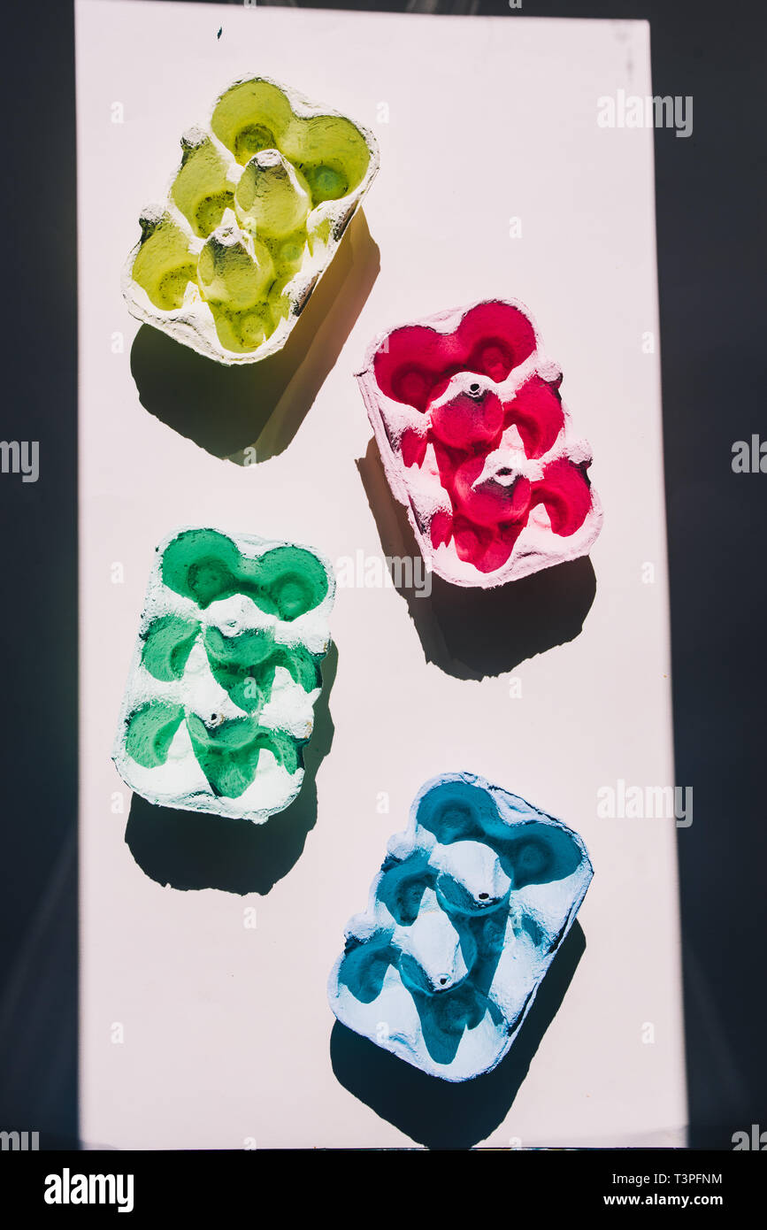 Colored eggs container, easter concept, hard natural direct light Stock ...