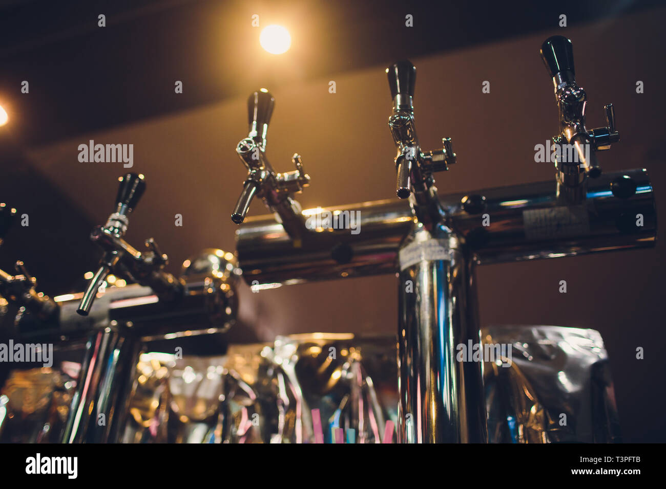 The bar counter with bottles and apparatus for dispensing beer ...
