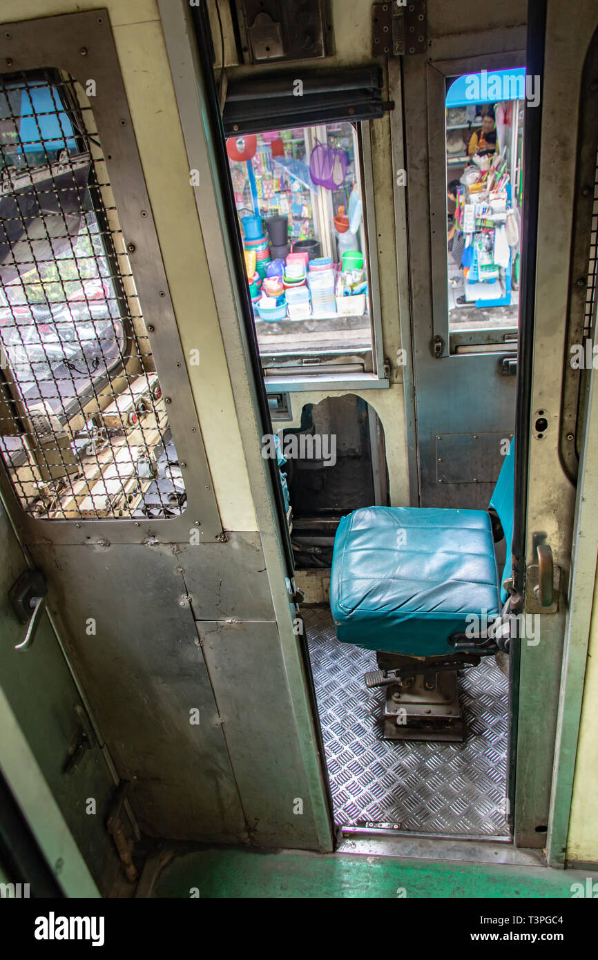 The train driver's cab in the old train standing at railway station ...
