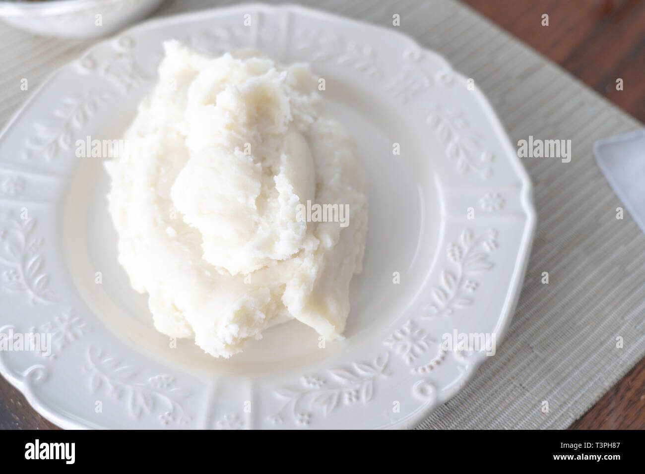 Nigerian Pounded yam on white plate ready to eat Stock Photo - Alamy