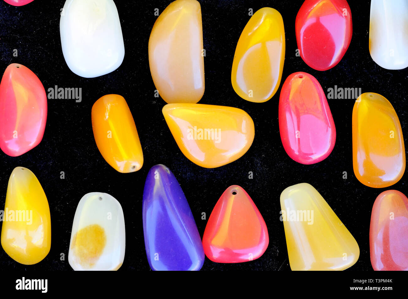 Many colorful jade stones Stock Photo - Alamy