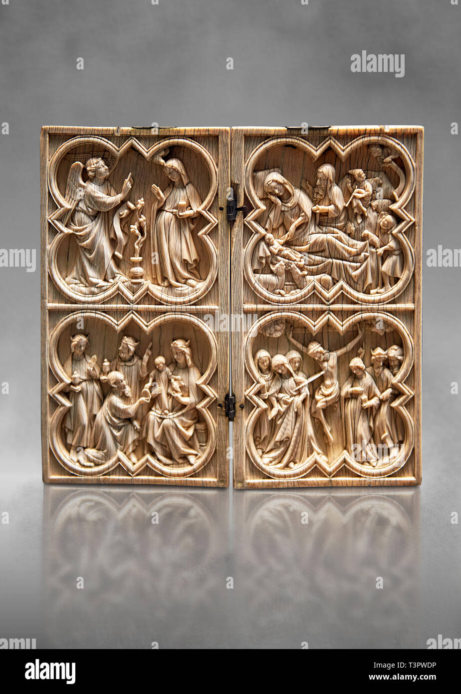 Medieval Gothic ivory diptych depicting the Annunciation, Nativity, the ...