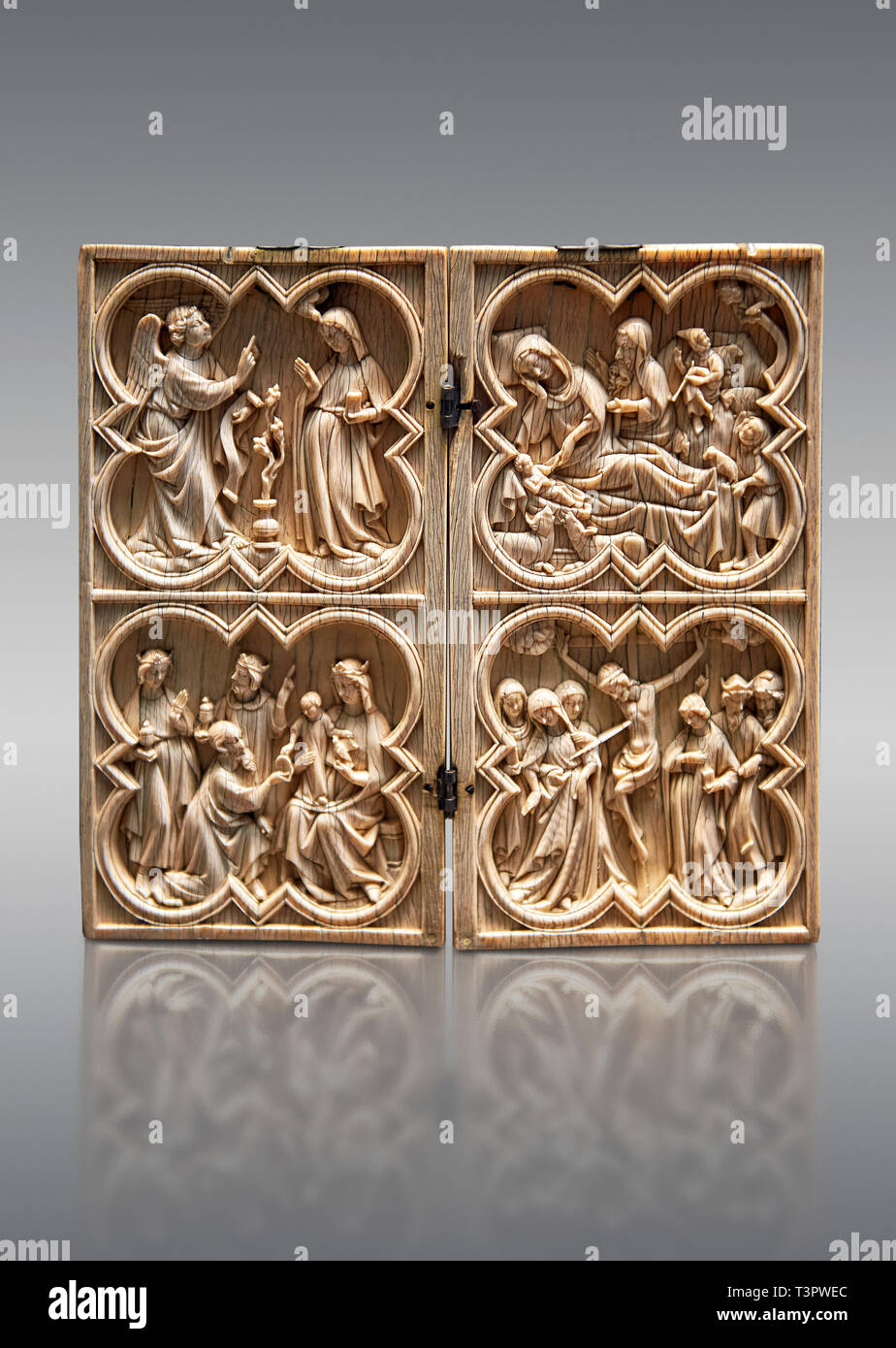 Medieval Gothic ivory diptych depicting the Annunciation, Nativity, the adoration of the Magi ...