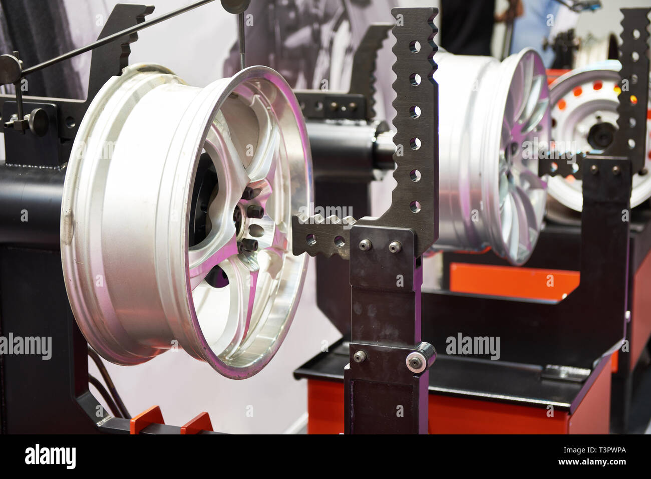 Stand for the straightening alloy wheels disk Stock Photo - Alamy
