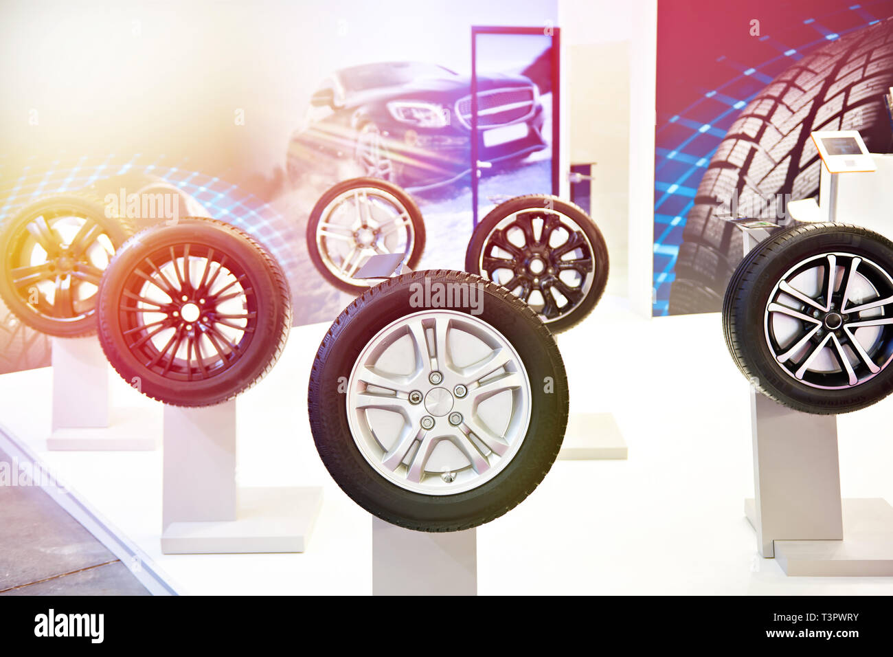 Wheels of cars in the store Stock Photo - Alamy