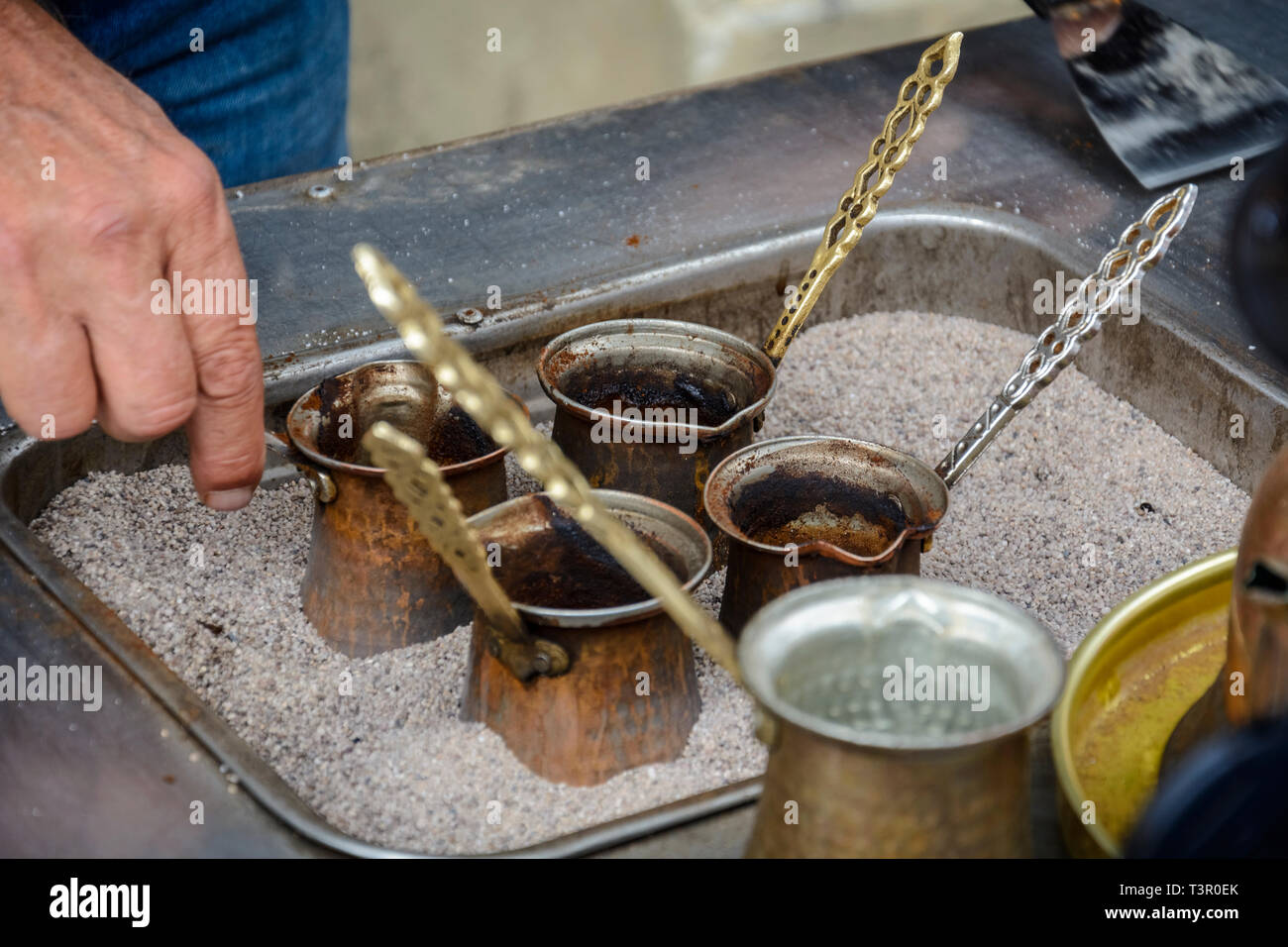 handmade turkish coffee cooked in the sand Stock Photo - Alamy