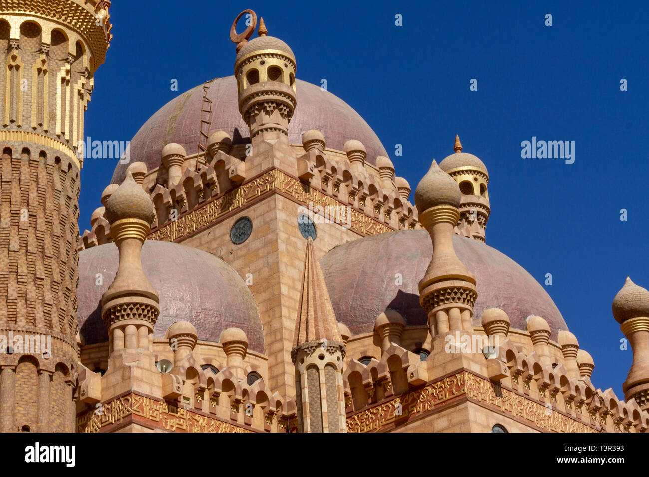 Old eastern architecture on a background of blue sky close-up ...