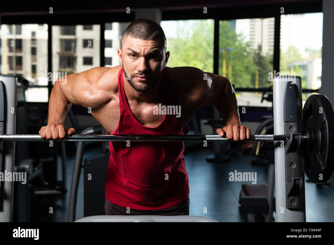 Fitness Athlete Relaxing In Gym After Exercise Stock Photo - Alamy