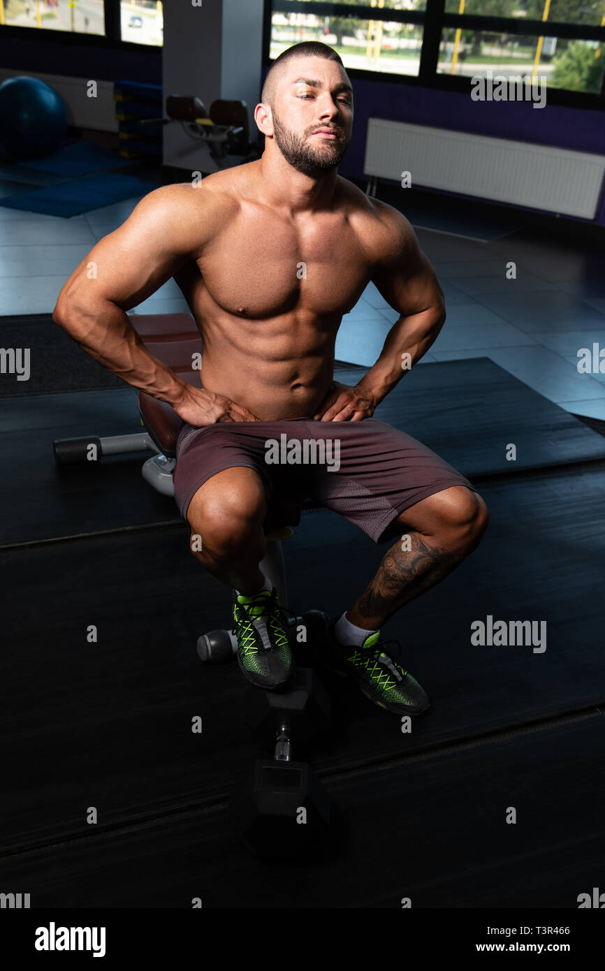 Handsome Man After Exercise Resting In Gym Stock Photo - Alamy