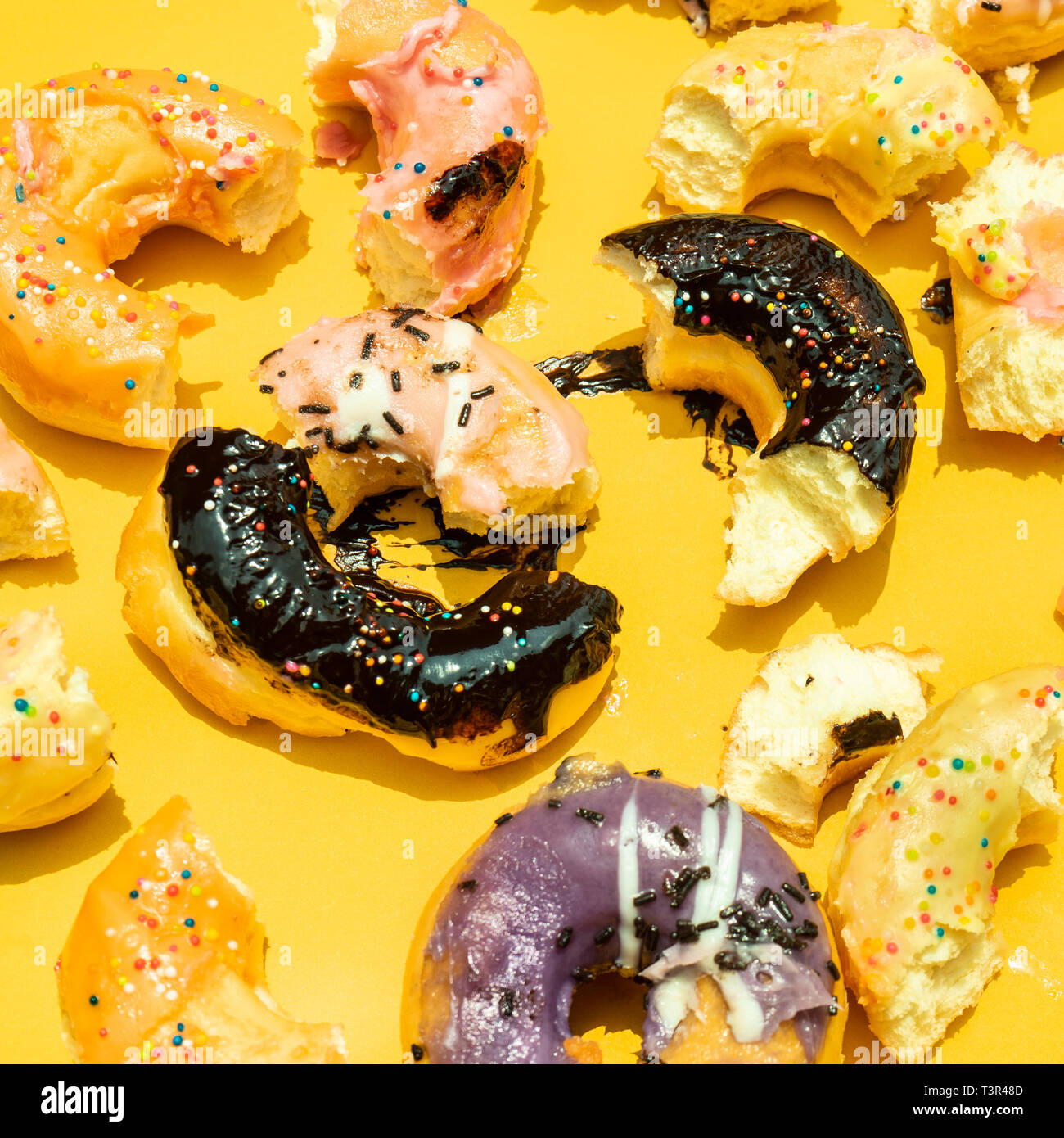 Top view of dirty donut on color pastel background.Eating and Healthy ...