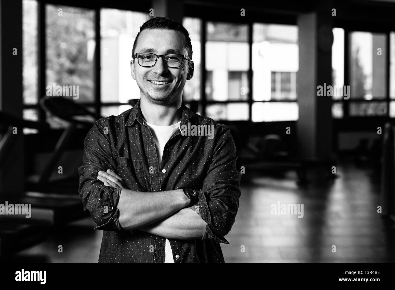 Skinny man at gym Black and White Stock Photos & Images - Alamy