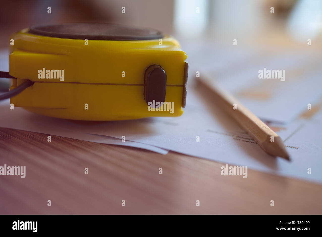 Architecture plan, roulette, eraser and pencil Stock Photo - Alamy