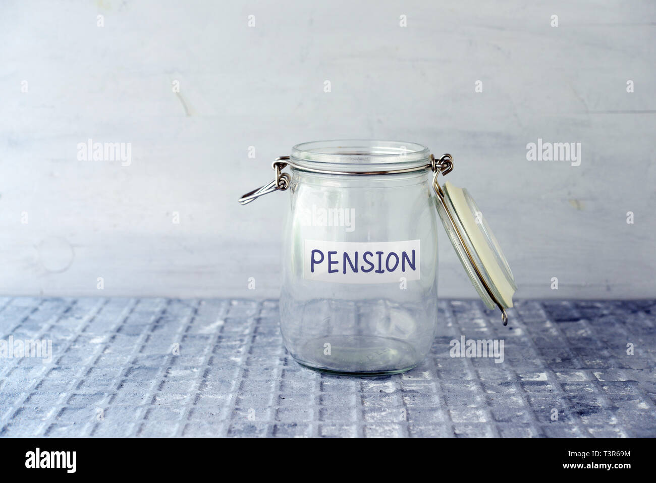 Empty glass money jar with pension label, financial concept Stock Photo ...