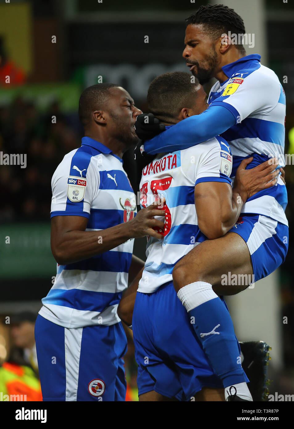 Andy Rinomhota (centre) of Reading celebrates with Garath McCleary ...