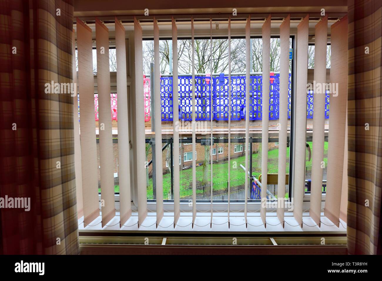 UK Residential flat window with Scaffolding erected outside Stock Photo ...