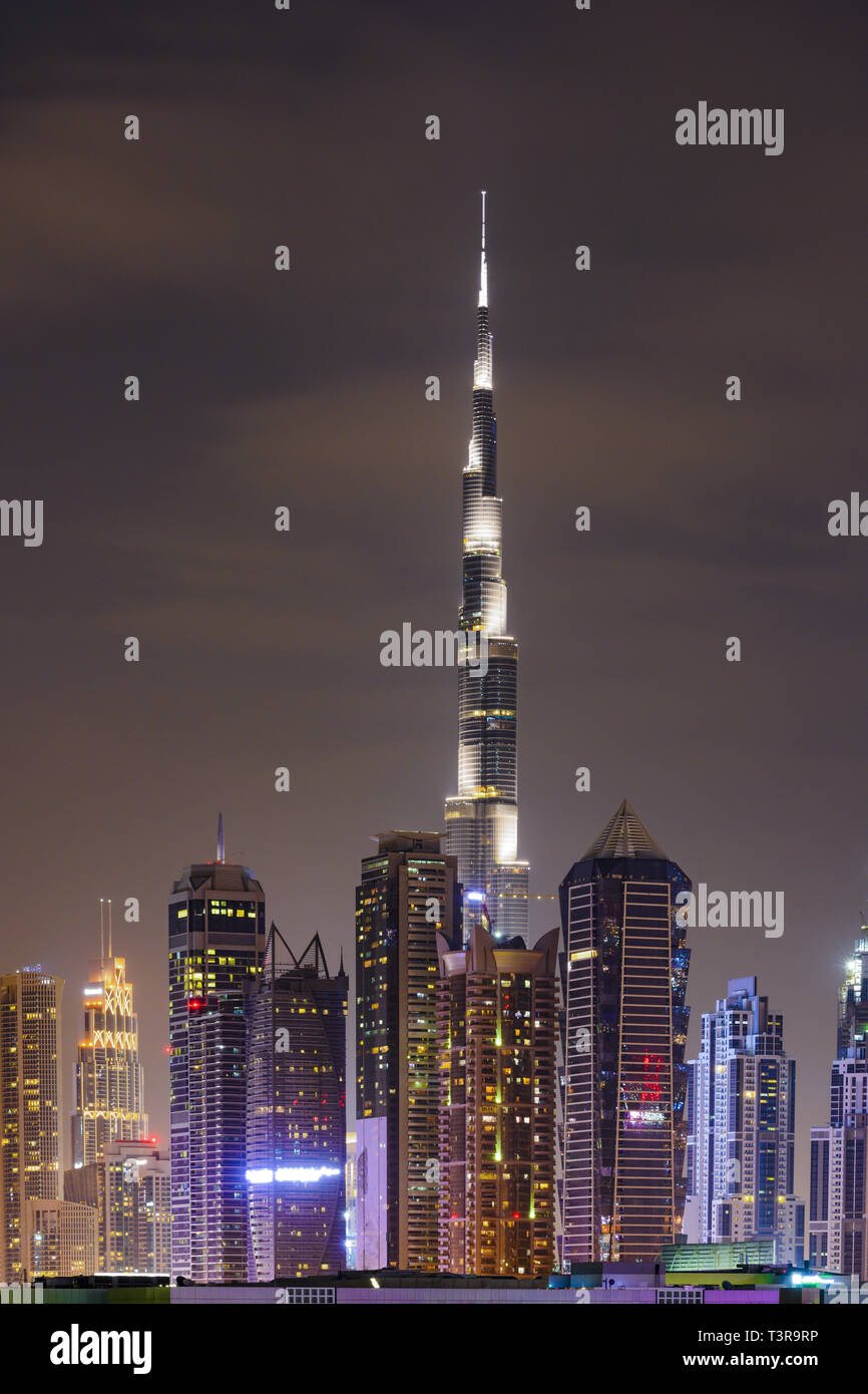 Stunning view of the illuminated Dubai skyline during sunset with the ...