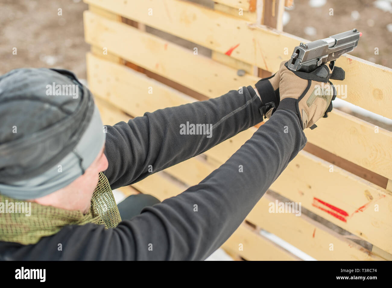 Man holding gun from behind hi-res stock photography and images - Alamy