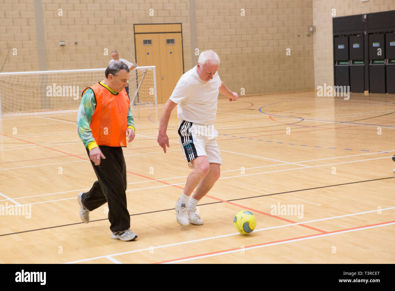 Seniors Playing Football High Resolution Stock Photography and Images ...