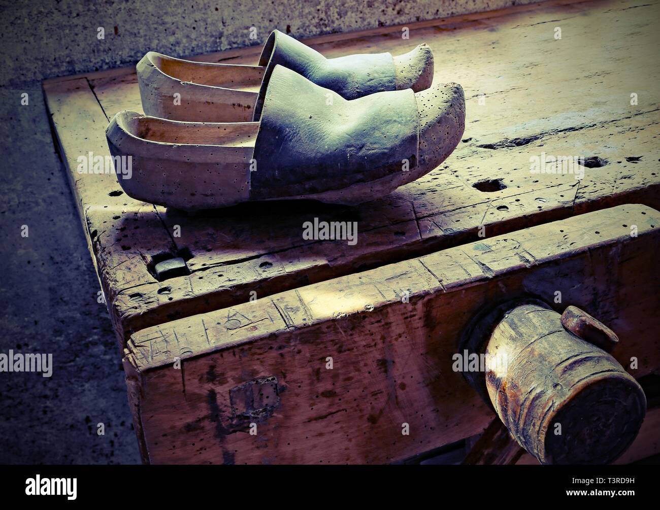 Dutch wooden clogs in the Shoemaker's Workbench with old toned effect ...
