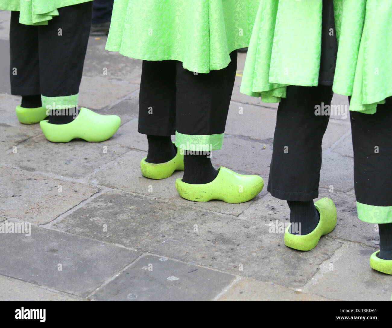 Dutch people with clogs and black trousers Stock Photo - Alamy