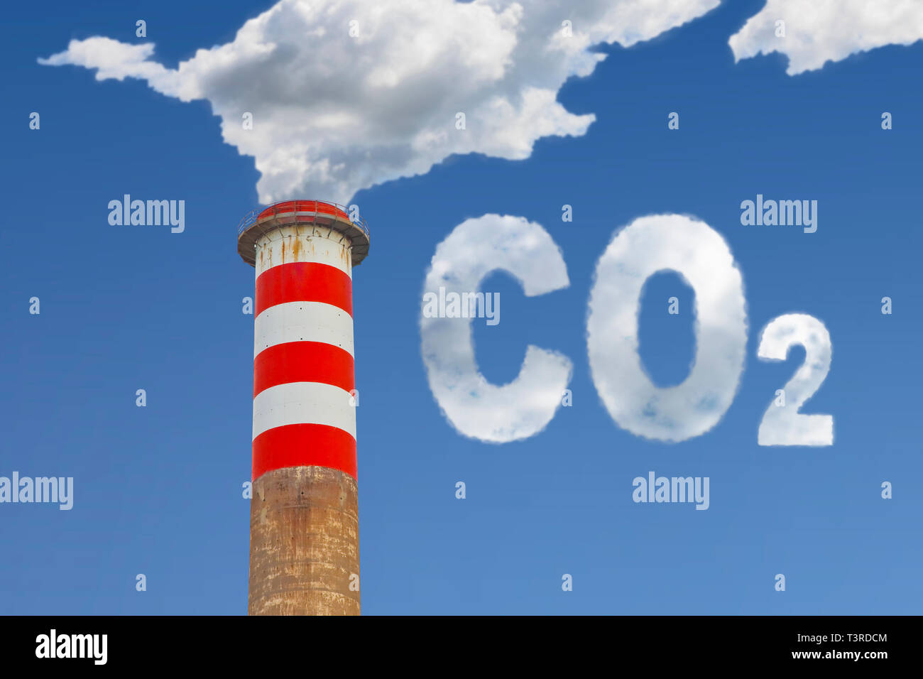 High concrete chimney emits CO2 into the atmosphere - concept image ...