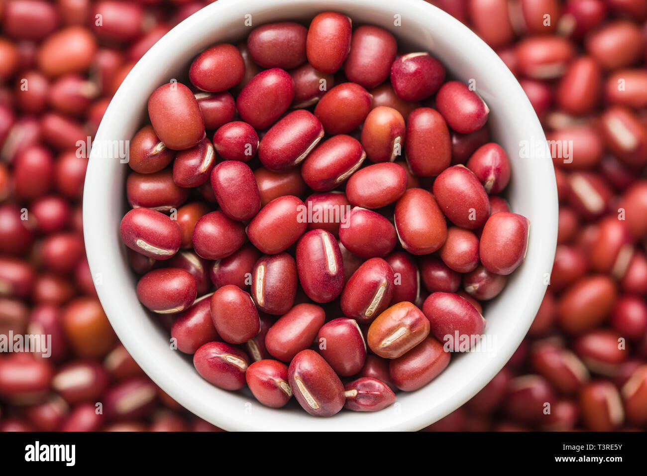 Red adzuki beans in bowl. Top view Stock Photo - Alamy