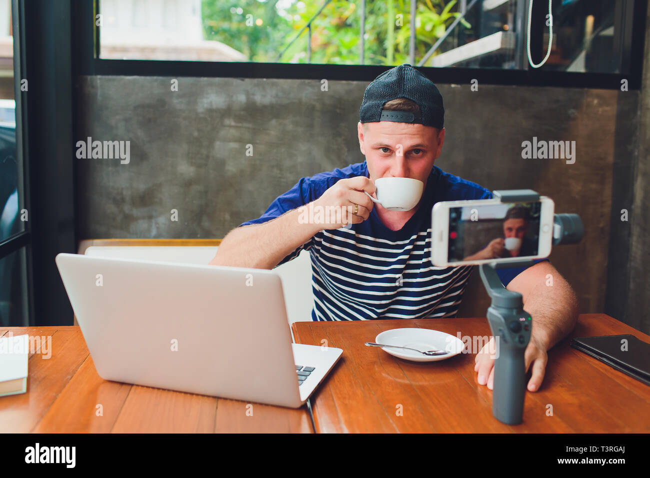 Bearded man vlogger talking in hi-res stock photography and images - Alamy