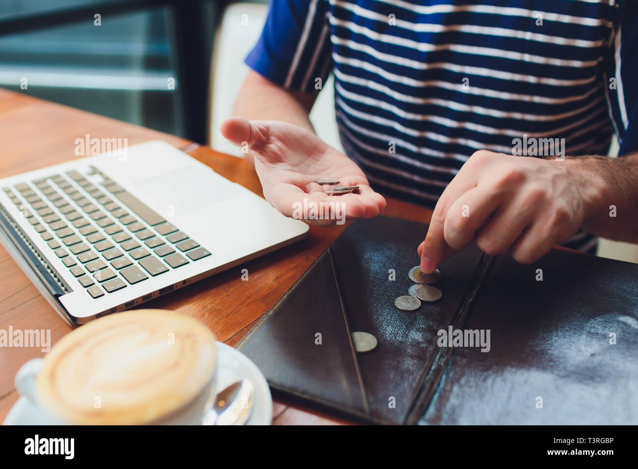 man paying bill in cafe. He putting money. Busy man having lunch in ...