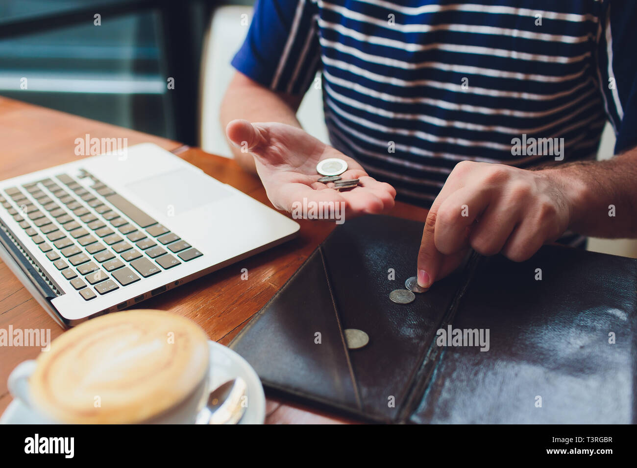 man paying bill in cafe. He putting money. Busy man having lunch in ...