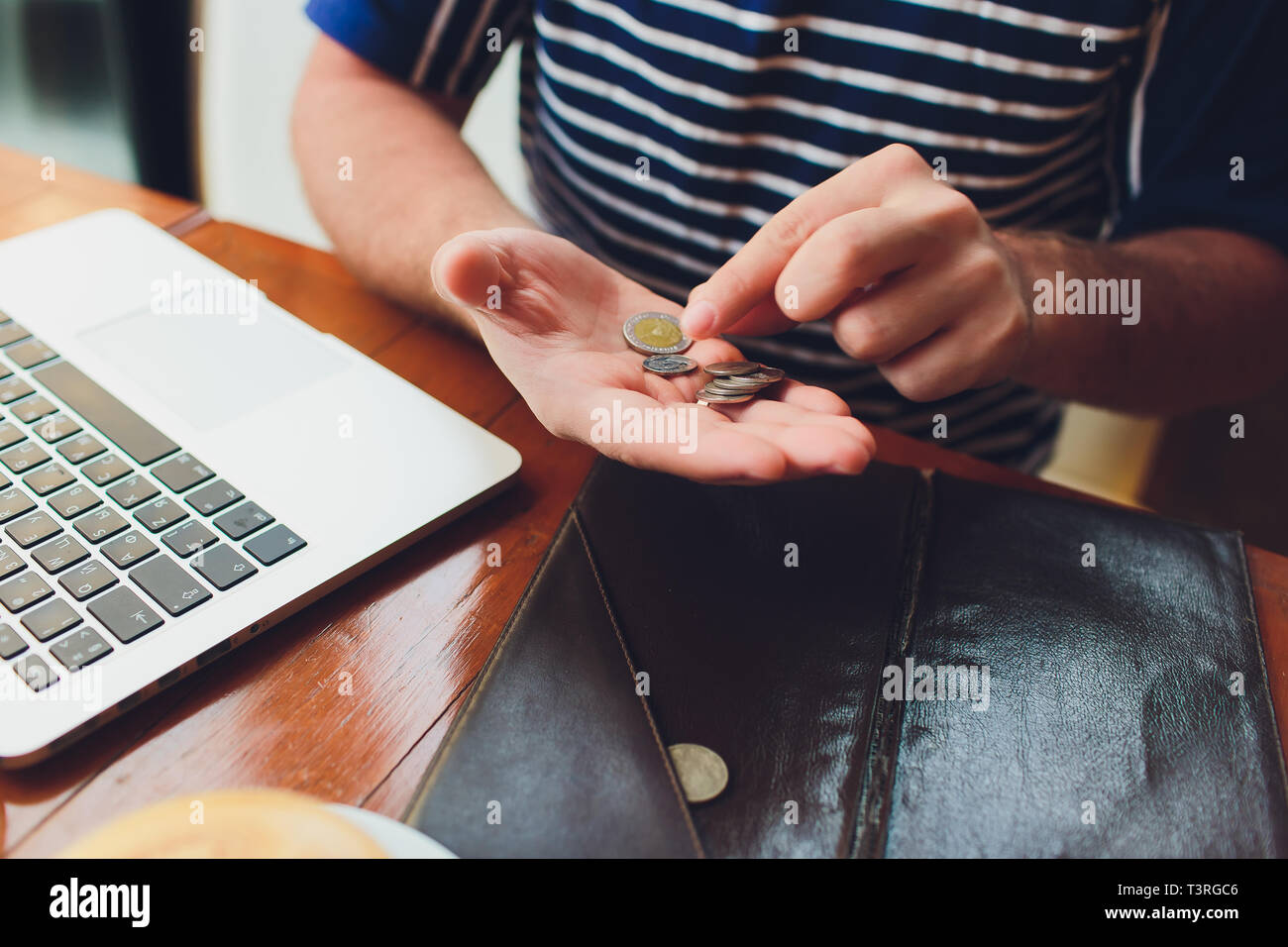 man paying bill in cafe. He putting money. Busy man having lunch in ...
