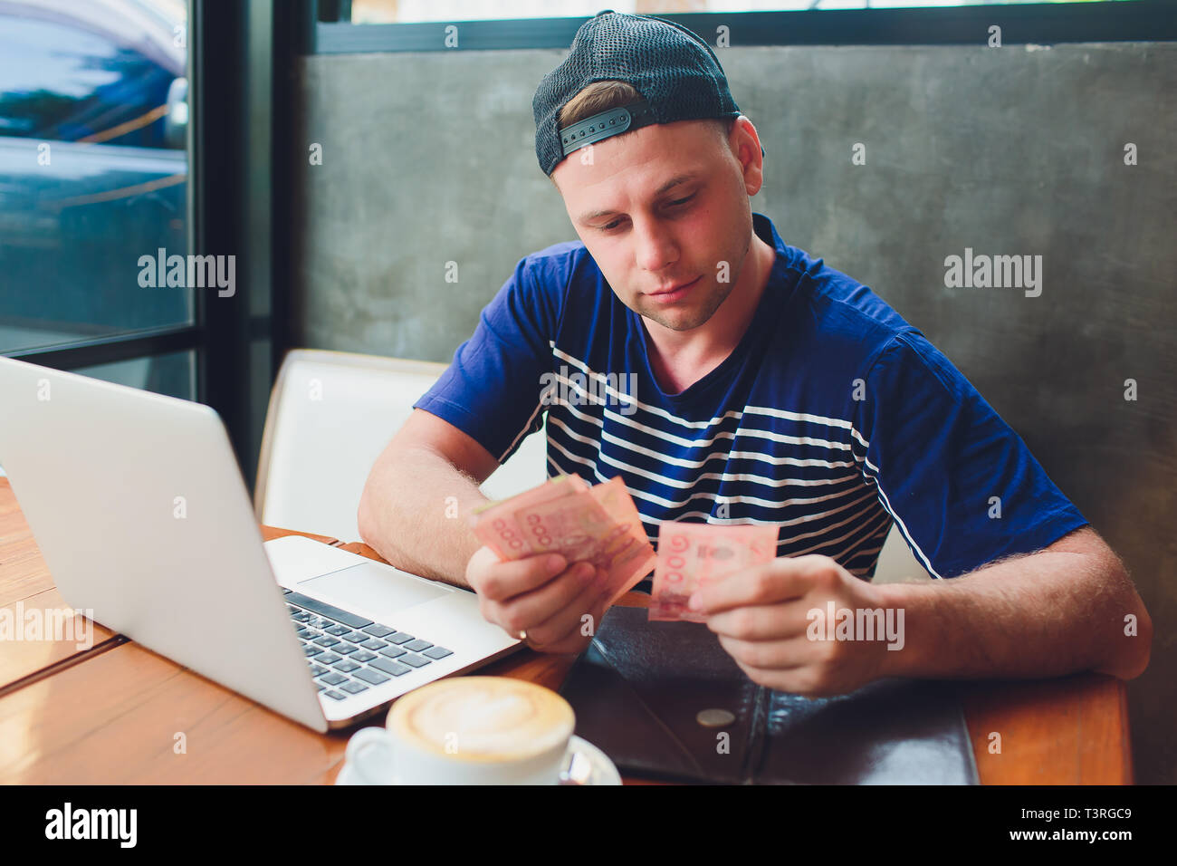 man paying bill in cafe. He putting money. Busy man having lunch in ...