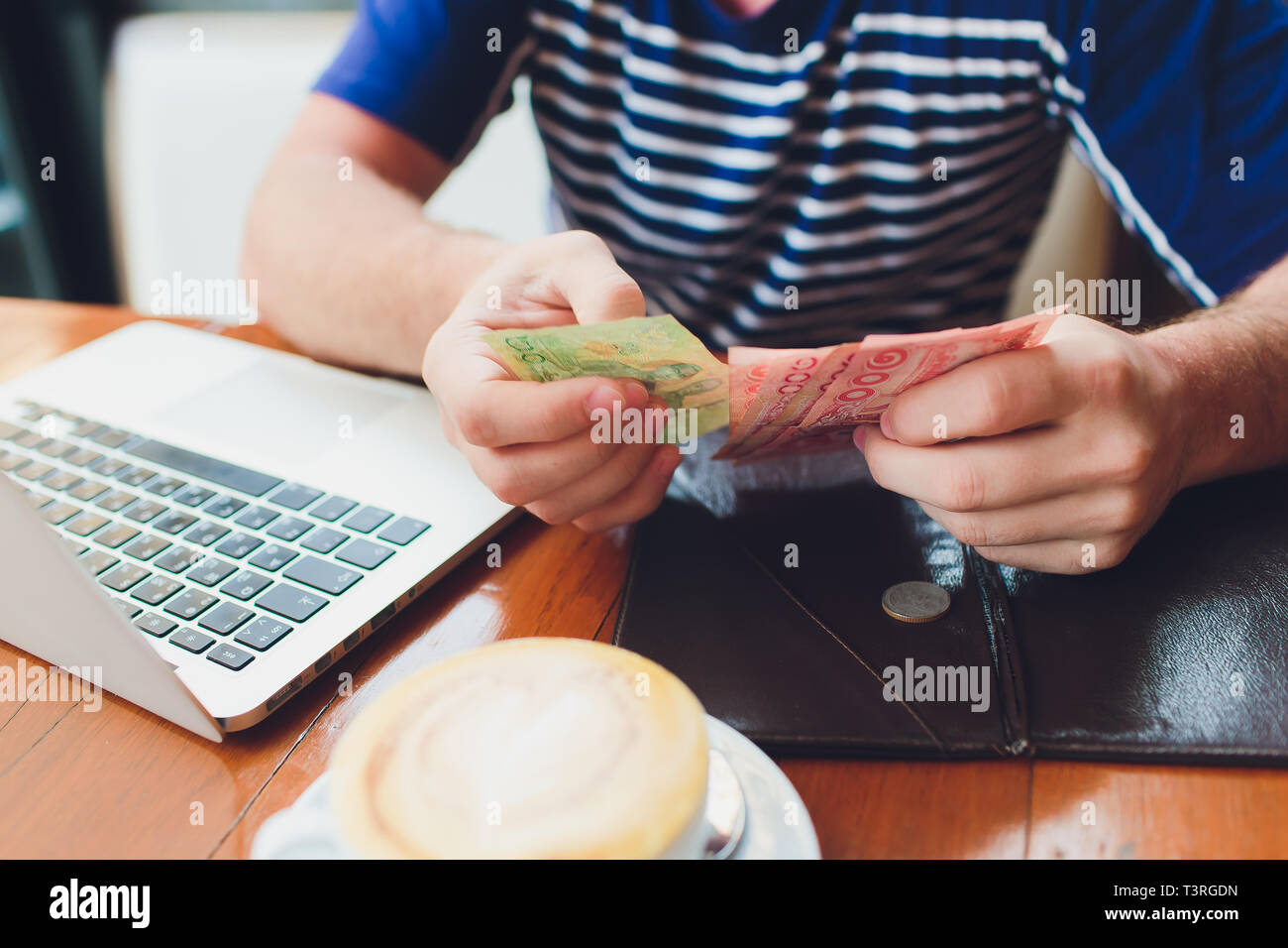 man paying bill in cafe. He putting money. Busy man having lunch in ...