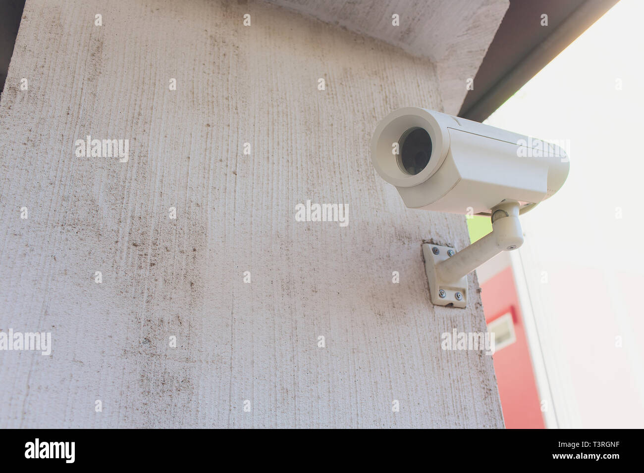 CCTV camera or surveillance installed on wall Stock Photo - Alamy
