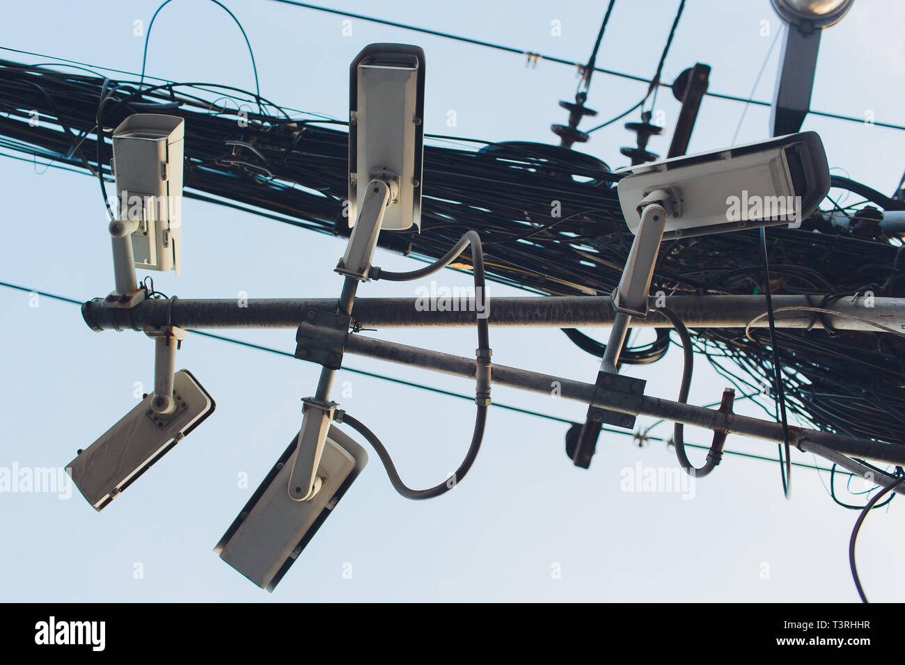 Crazy messy chaos wires cables on Electric poles Stock Photo - Alamy