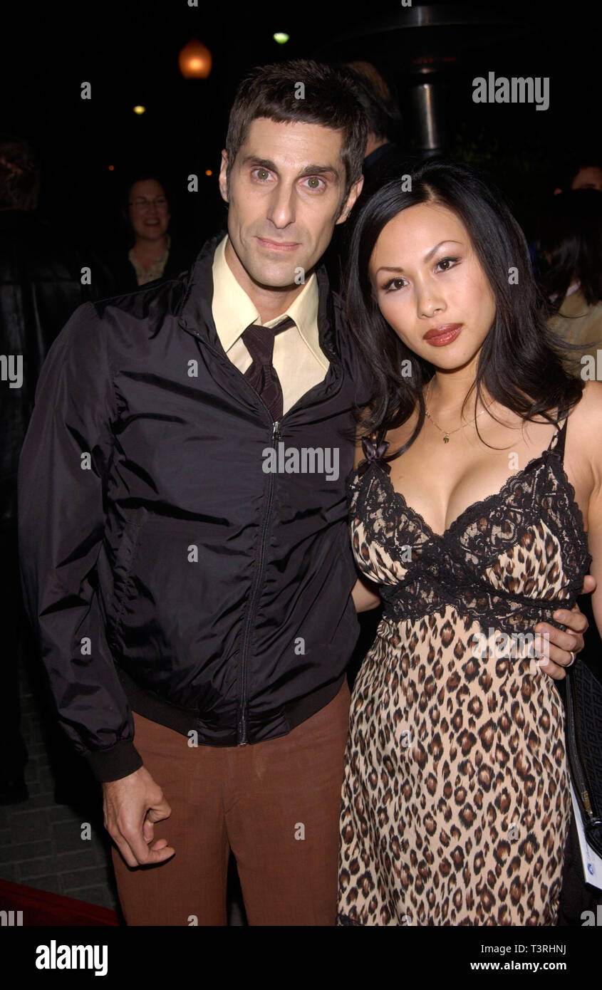 LOS ANGELES, CA. October 14, 2002: Rock star PERRY FARRELL & date at ...
